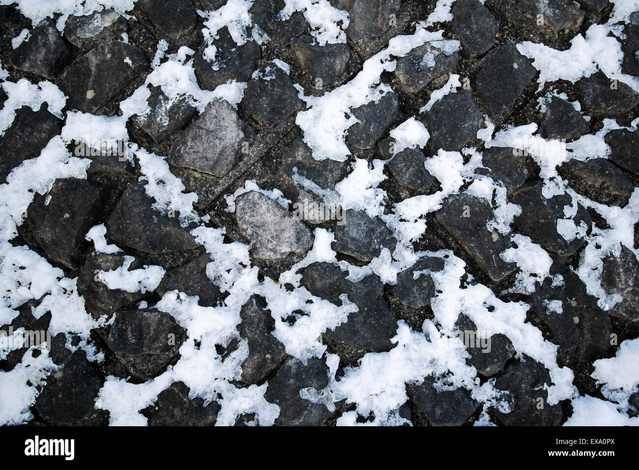 Snow on stone wall Stock Photo - Alamy