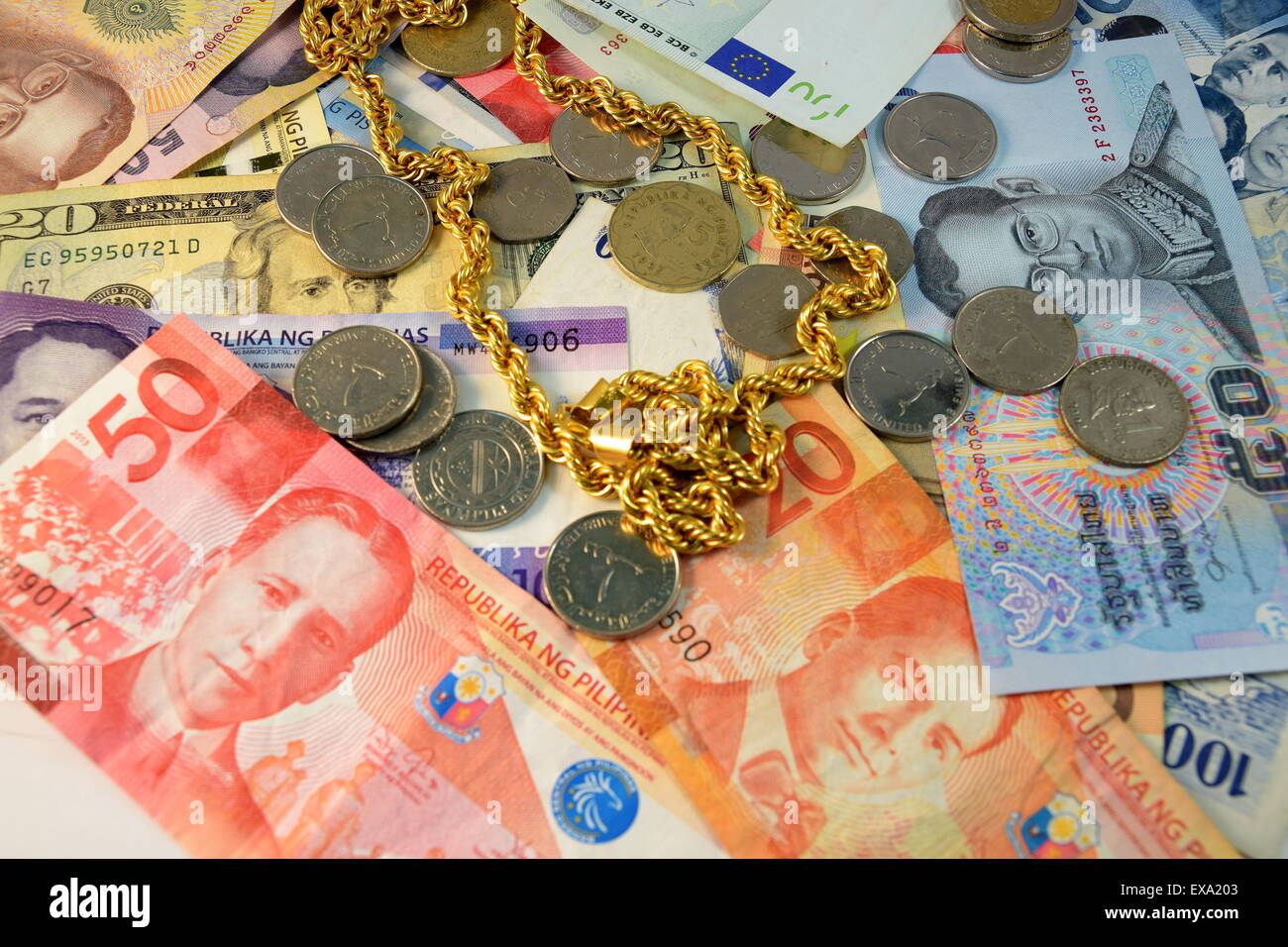 Close up of Various currency notes and coins from different countries ...