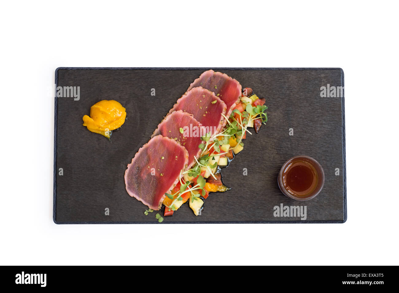 fresh tuna fish salad with mango sauce Stock Photo - Alamy