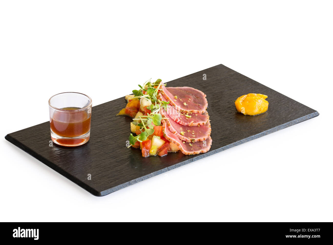 fresh tuna fish salad with mango sauce Stock Photo - Alamy