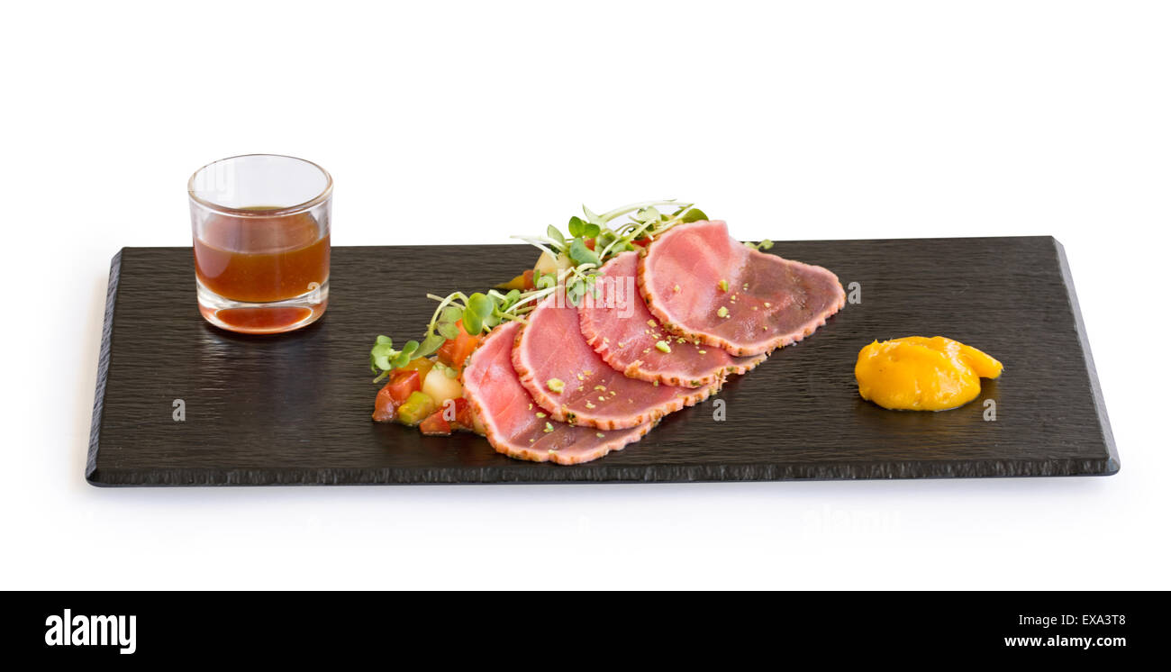 Fresh tuna dish served Cut Out Stock Images & Pictures - Alamy