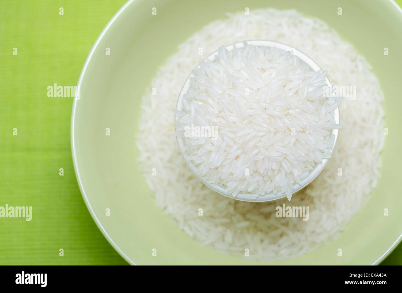 Rice in a cup of green Stock Photo - Alamy