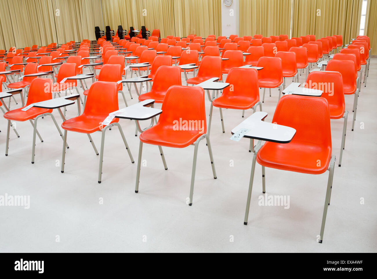 empty classroom and orange chairs Stock Photo - Alamy