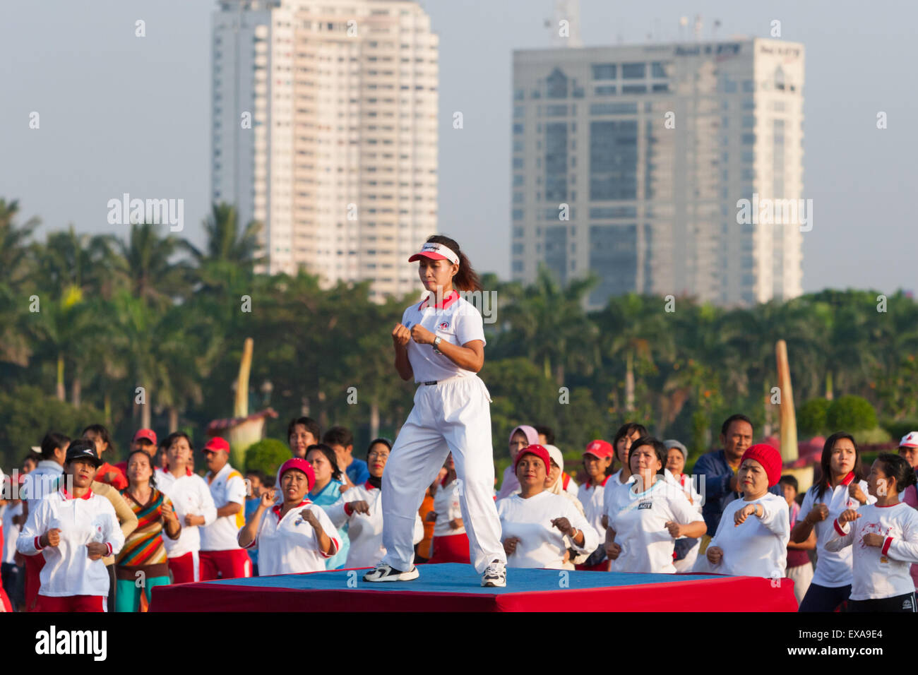 Hundreds of people participate in mass aerobic exercise, a part of a ...