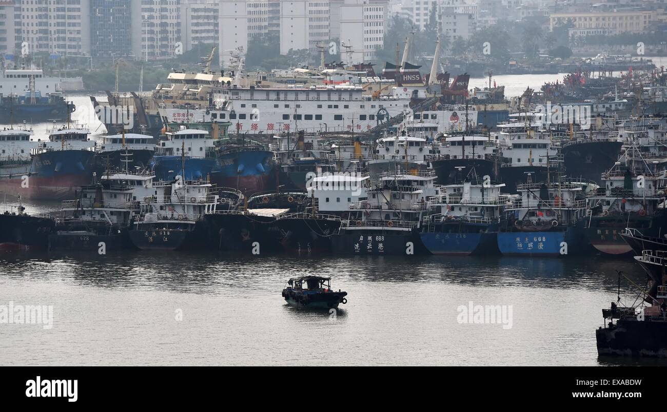 Haikou, China's Hainan Province. 10th July, 2015. Boats stay in Xingang ...
