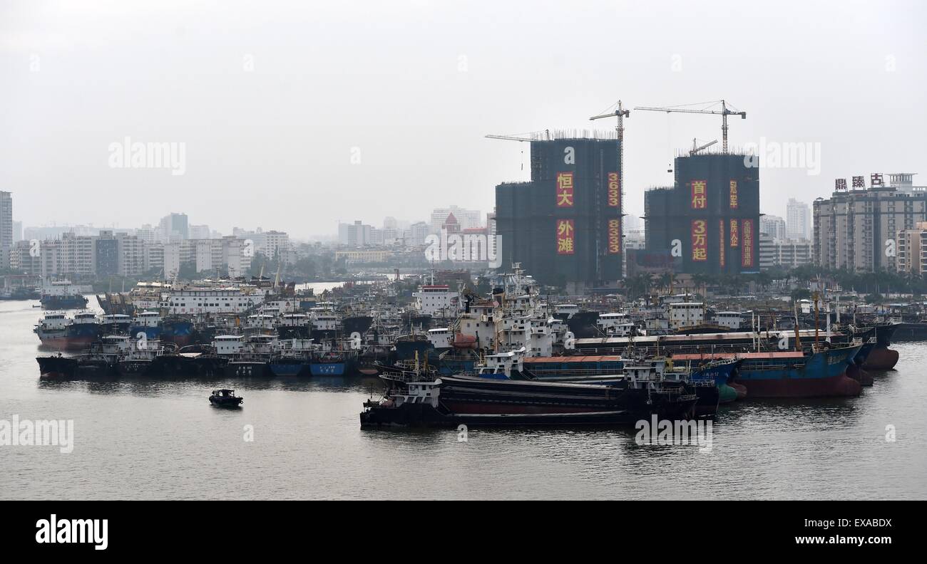 Haikou, China's Hainan Province. 10th July, 2015. Boats stay in Xingang ...