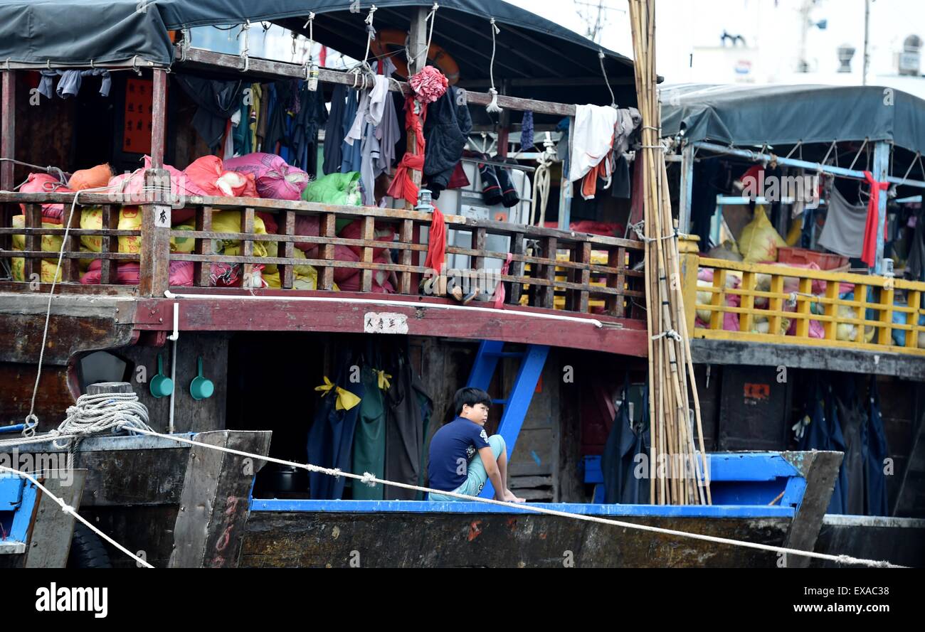 Haikou, China's Hainan Province. 10th July, 2015. Boats stay in Xingang ...