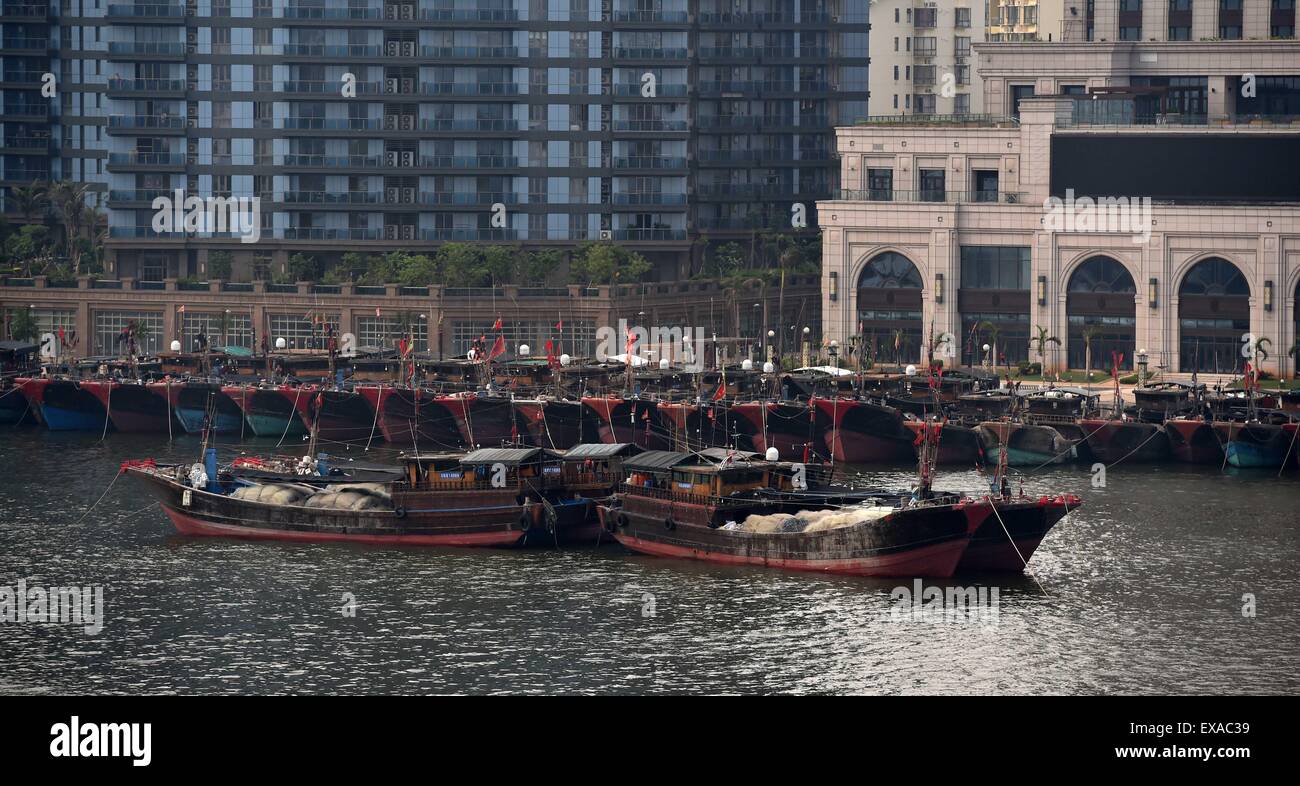 Haikou, China's Hainan Province. 10th July, 2015. Boats stay in Xingang ...