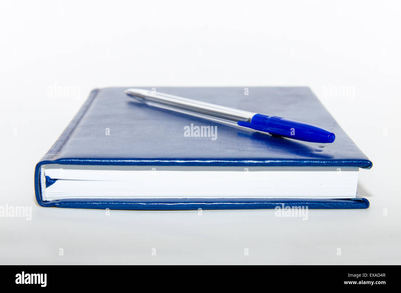 Pen and notebook Stock Photo - Alamy