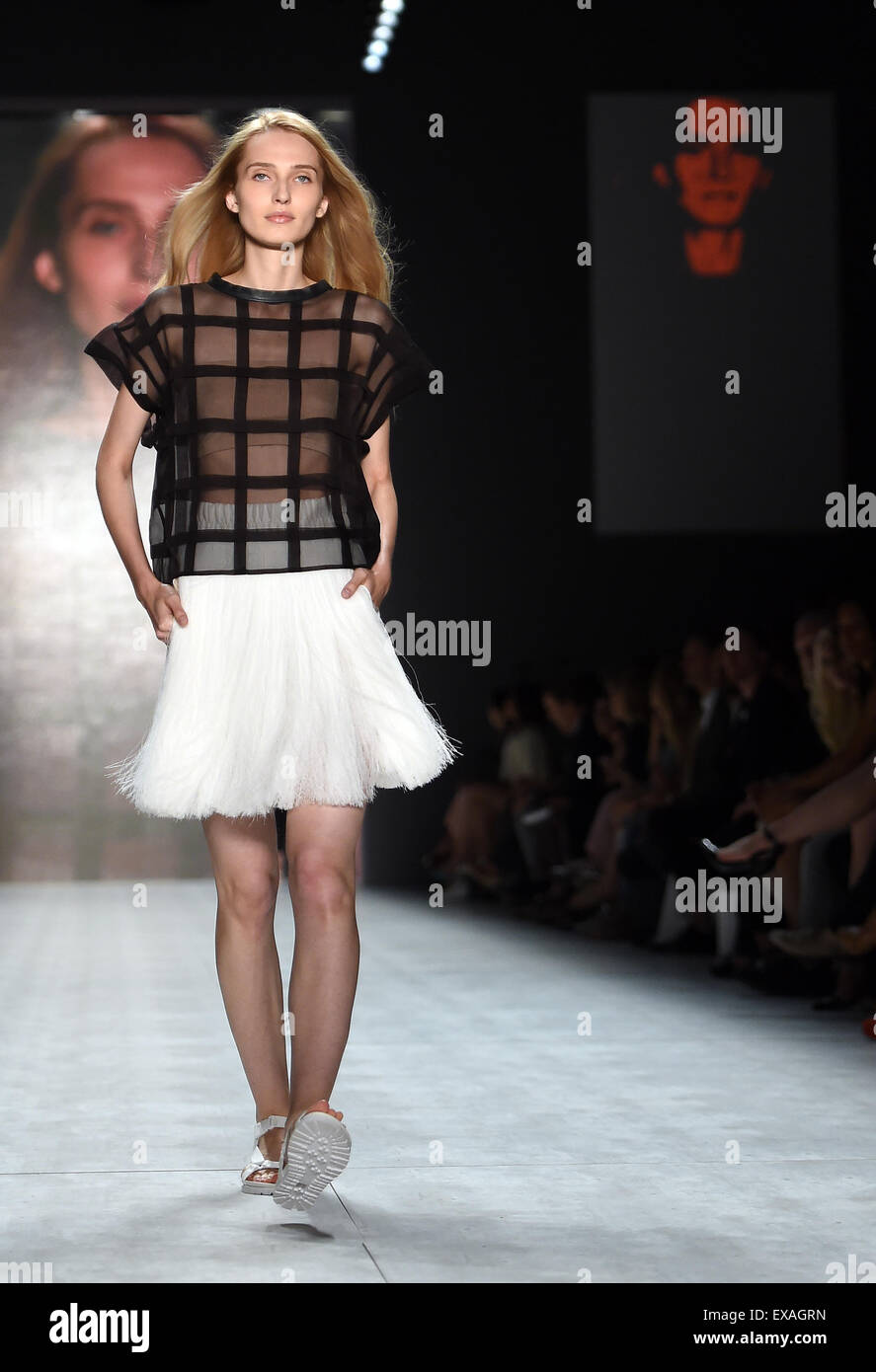 Berlin, Germany. 09th July, 2015. A model presenting designs from ...
