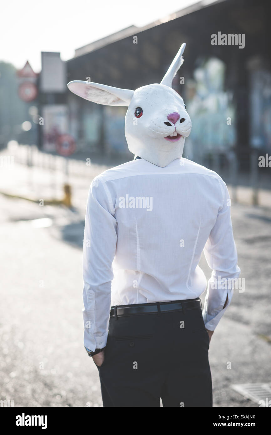 rabbit mask young handsome elegant blonde model man in the city Stock ...