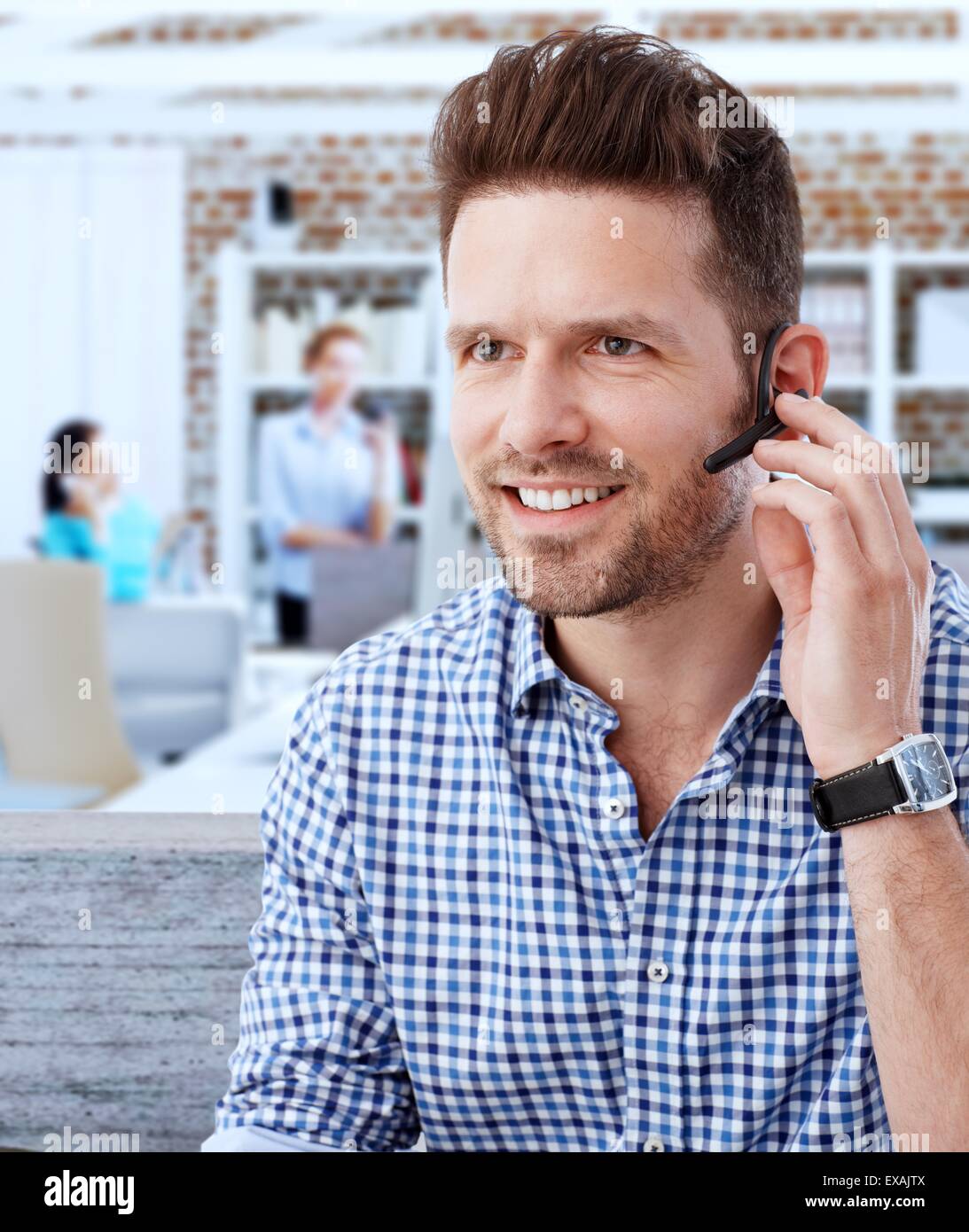 Portrait of male dispatcher working at office Stock Photo - Alamy