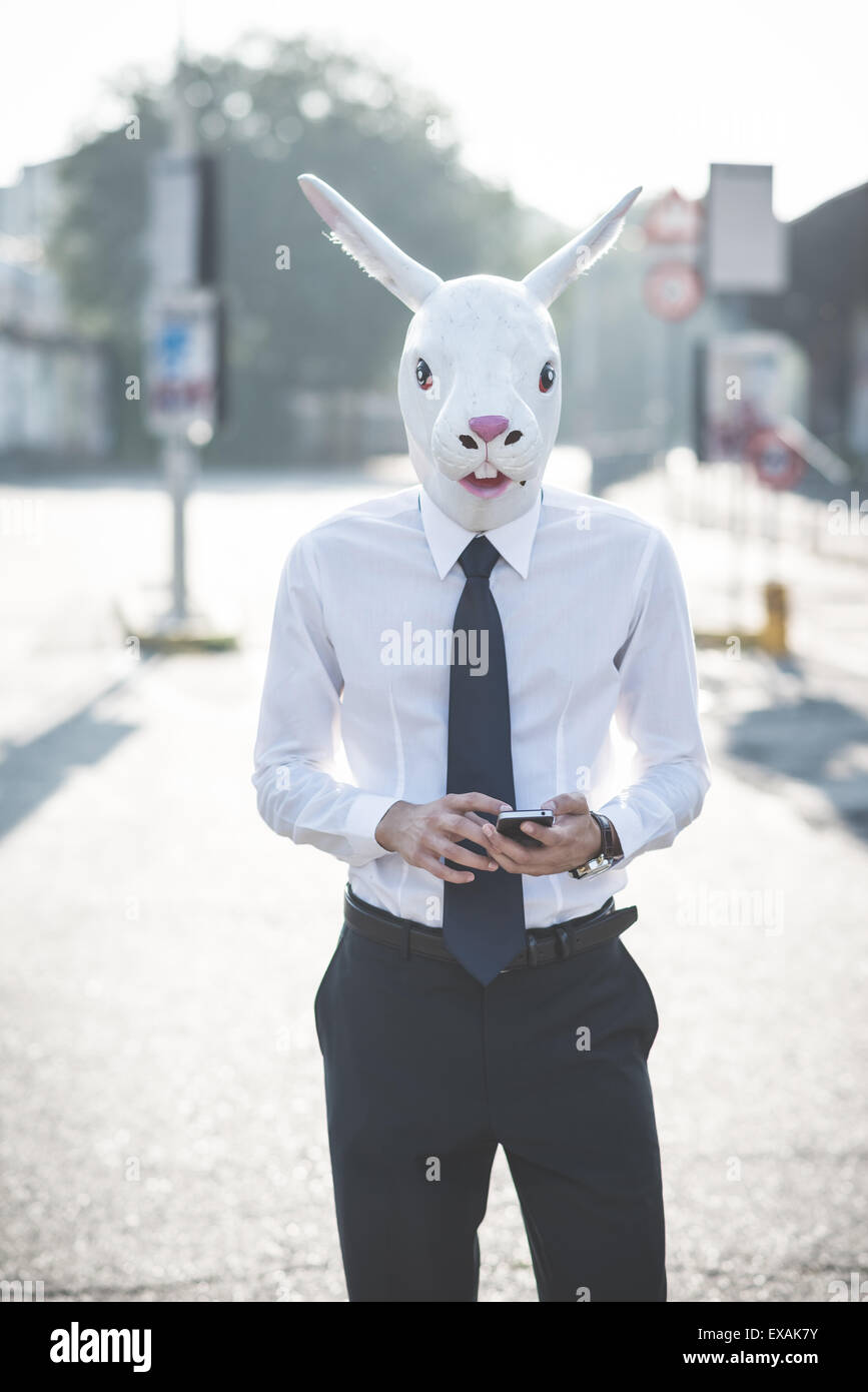rabbit mask young handsome elegant blonde model man in the city Stock ...