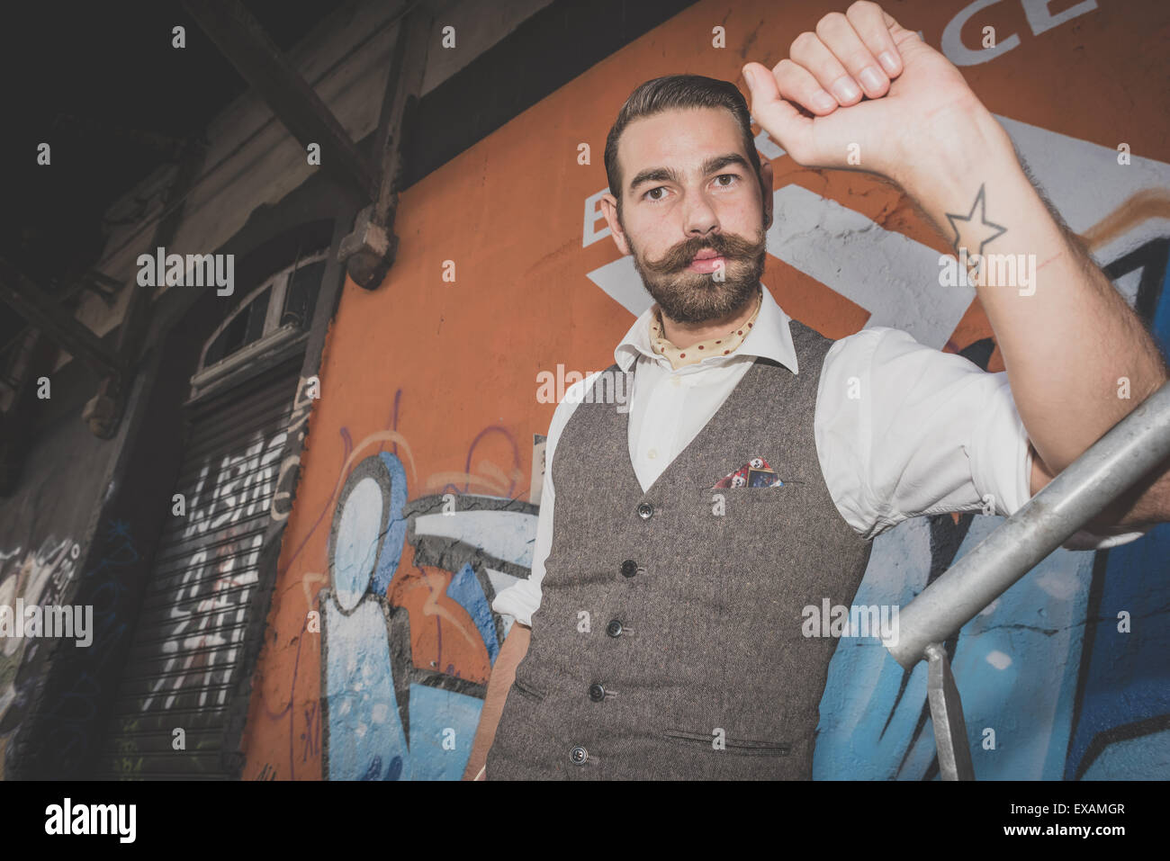 handsome big moustache hipster man playing mandolin in the city Stock ...