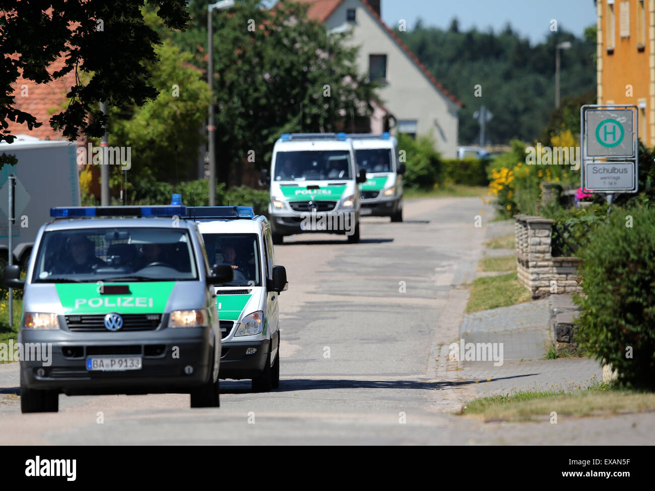 Leutershausen, Germany. 10th July, 2015. Police cars driving through ...