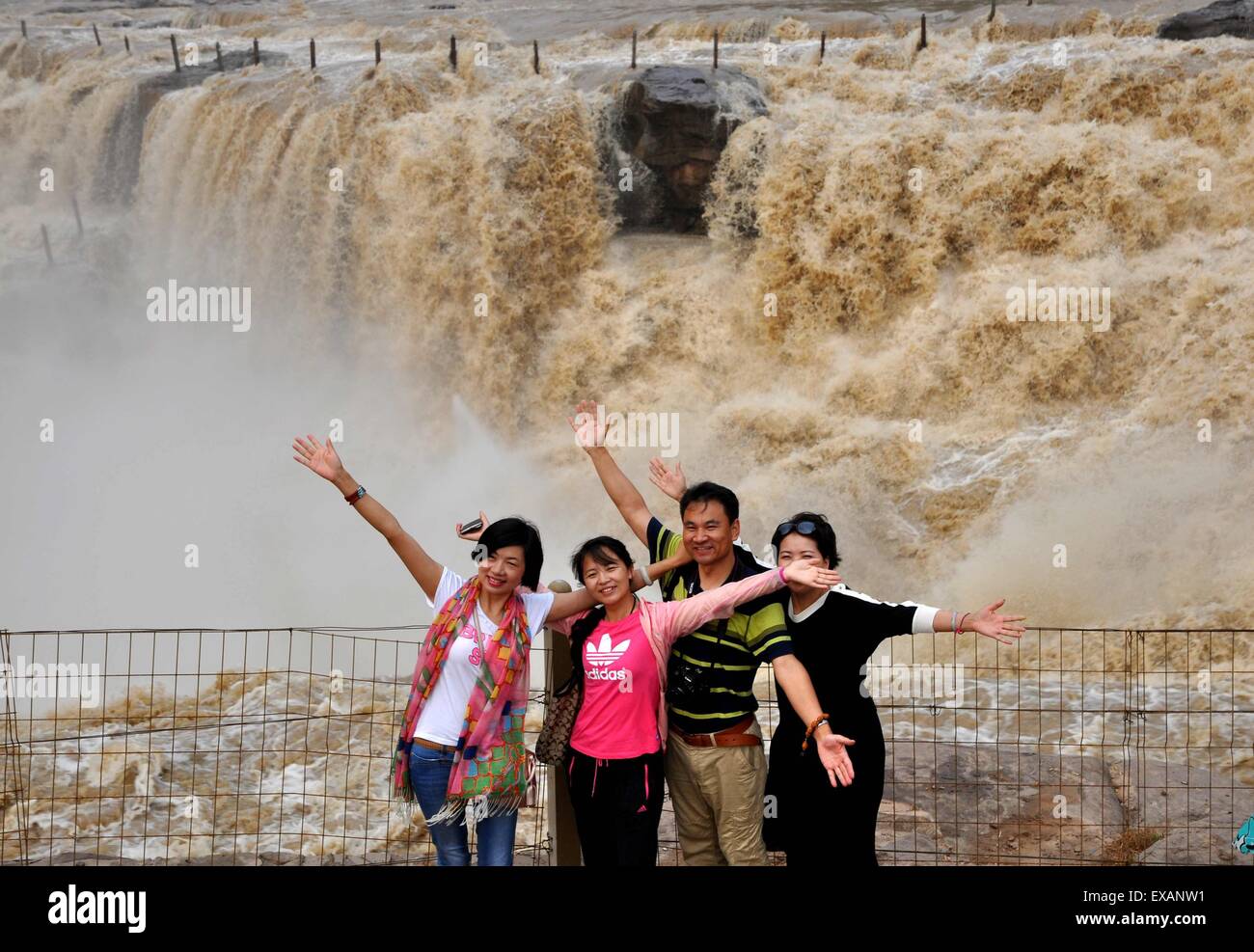 Linfen, China's Shanxi Province. 10th July, 2015. Tourists pose for ...