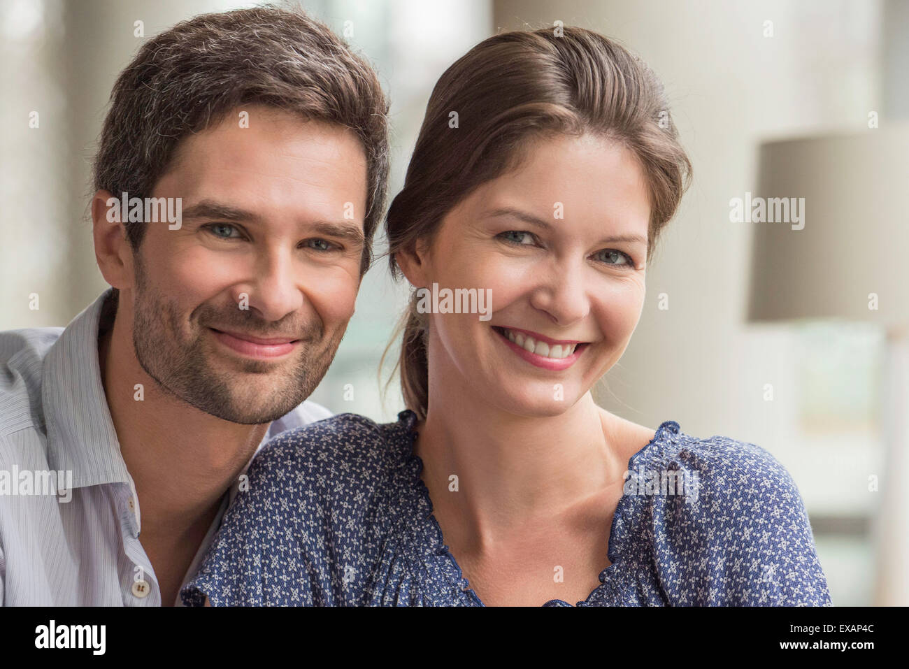 Couple together at home, portrait Stock Photo - Alamy