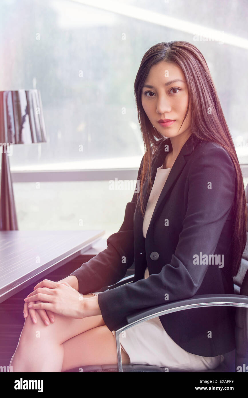 Business woman at desk, portrait Stock Photo - Alamy
