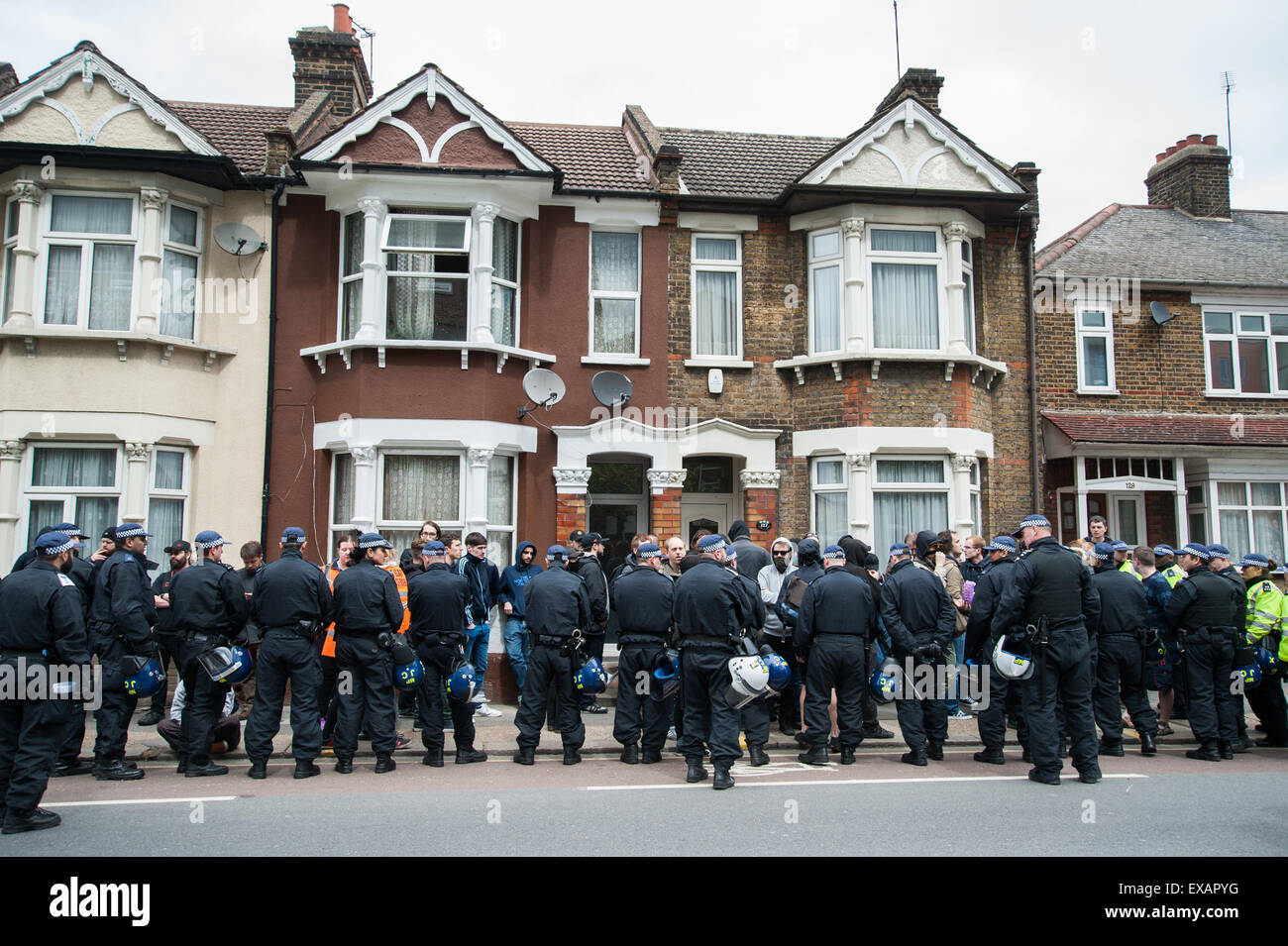 The English Defence League march in Walthamstow. A counter protest by ...