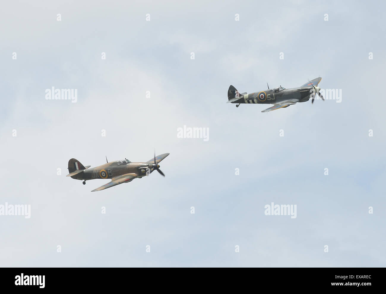 A Hurricane and Spitfire perform a Battle Of Britain Memorial Flight ...