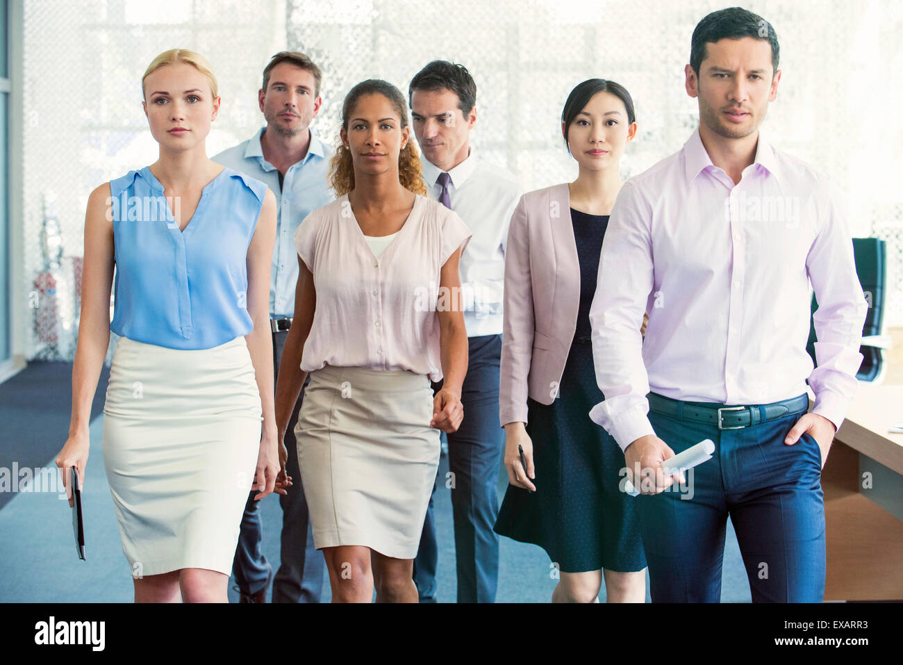 Officer workers marching in unison Stock Photo - Alamy