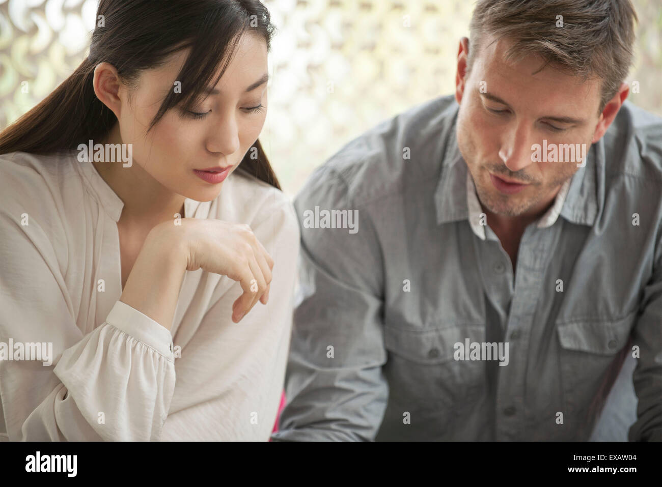 Colleagues working together Stock Photo - Alamy