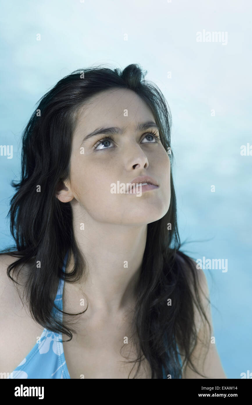 Woman looking up, portrait Stock Photo - Alamy