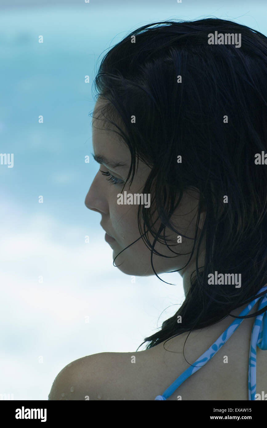 Woman wearing bathing suit, over the shoulder view Stock Photo - Alamy