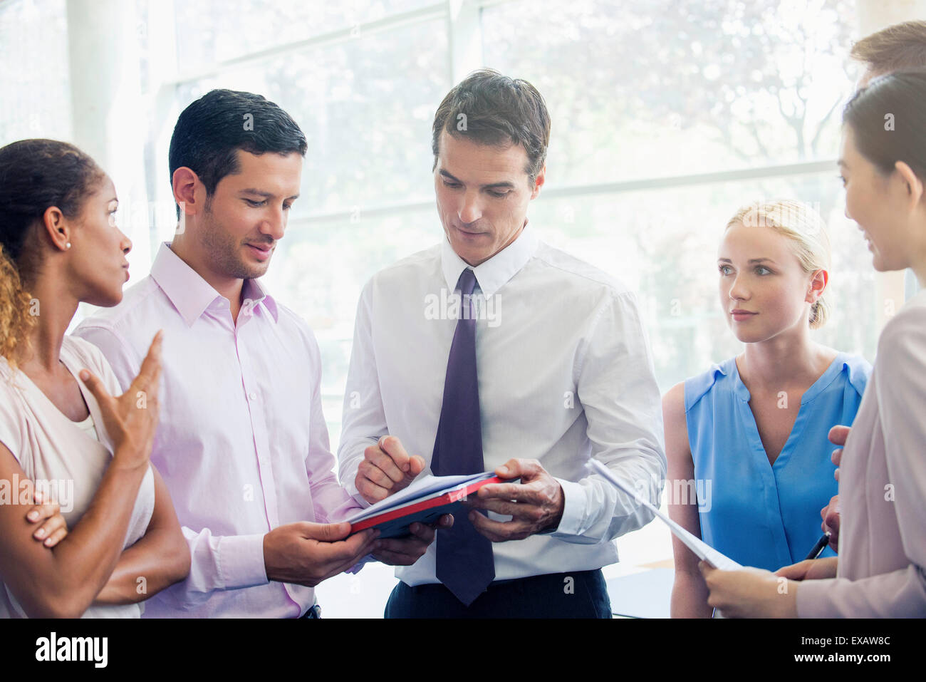 Business professionals brainstorming Stock Photo - Alamy