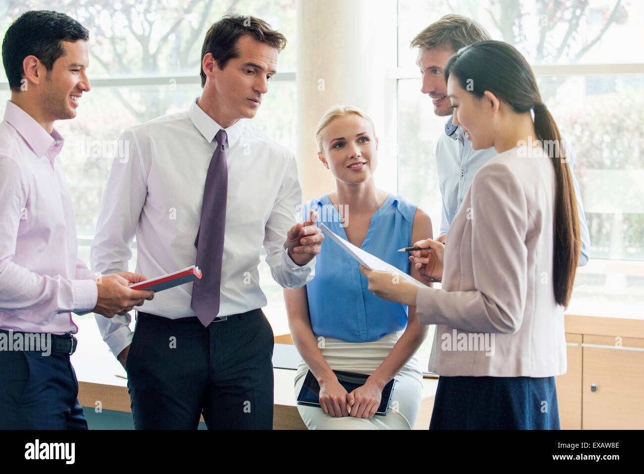 Ambitious team business associates meeting hi-res stock photography and ...