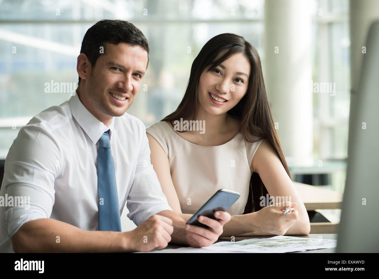 Business associates collaborating, portrait Stock Photo - Alamy