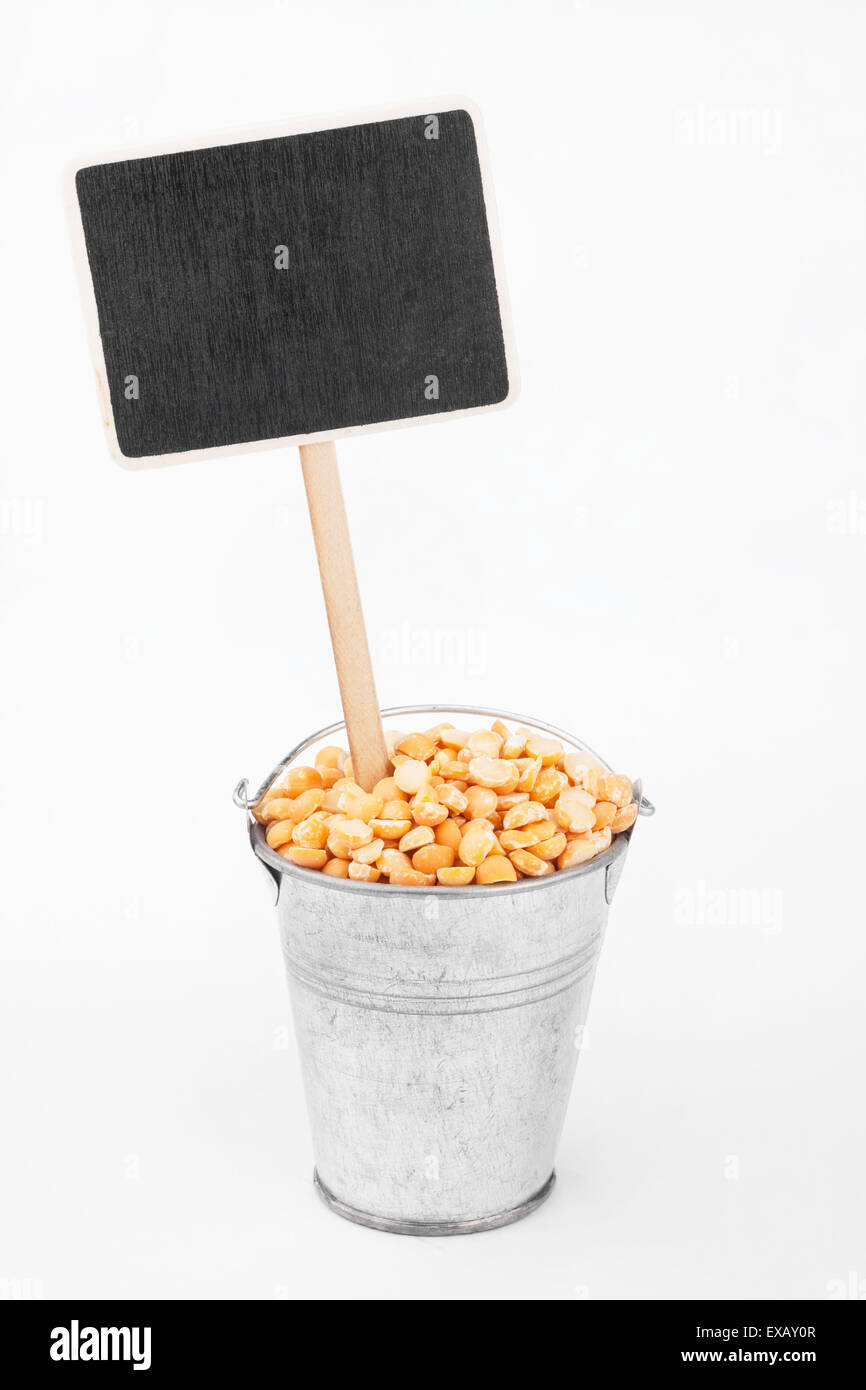 Pointer, price in bucket of peas grains, on a white background Stock ...