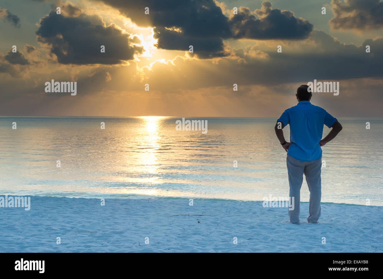 Man watches sun set hi-res stock photography and images - Alamy