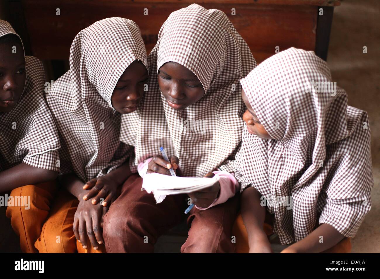 Children attending examen in Islamic school in Nigeria Stock Photo - Alamy