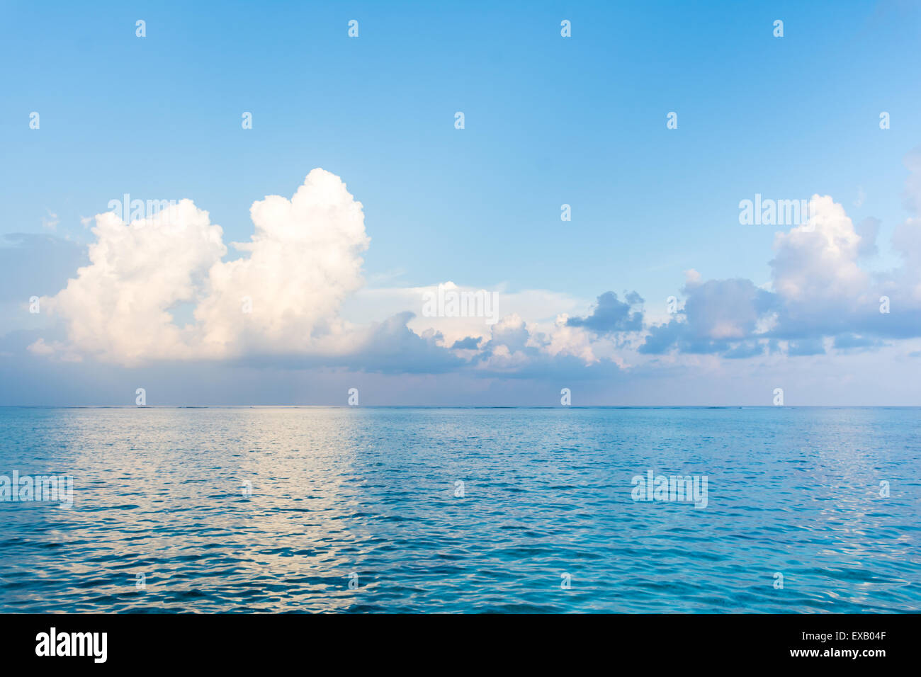 Cloudscape and the deep blue Indian Ocean Stock Photo - Alamy