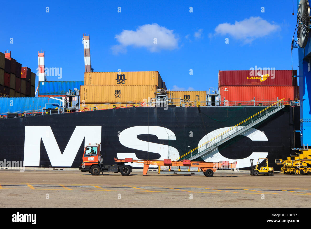International Mega Container ship unloading containers on service ...