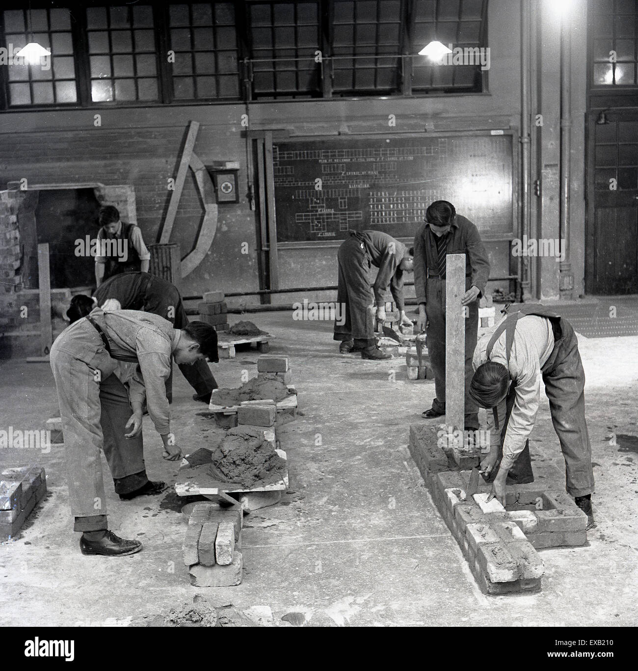 1950s, historical, group of young male apprentices practising or ...