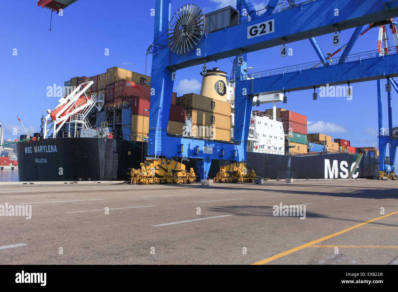 International Mega Container ship unloading containers on service ...