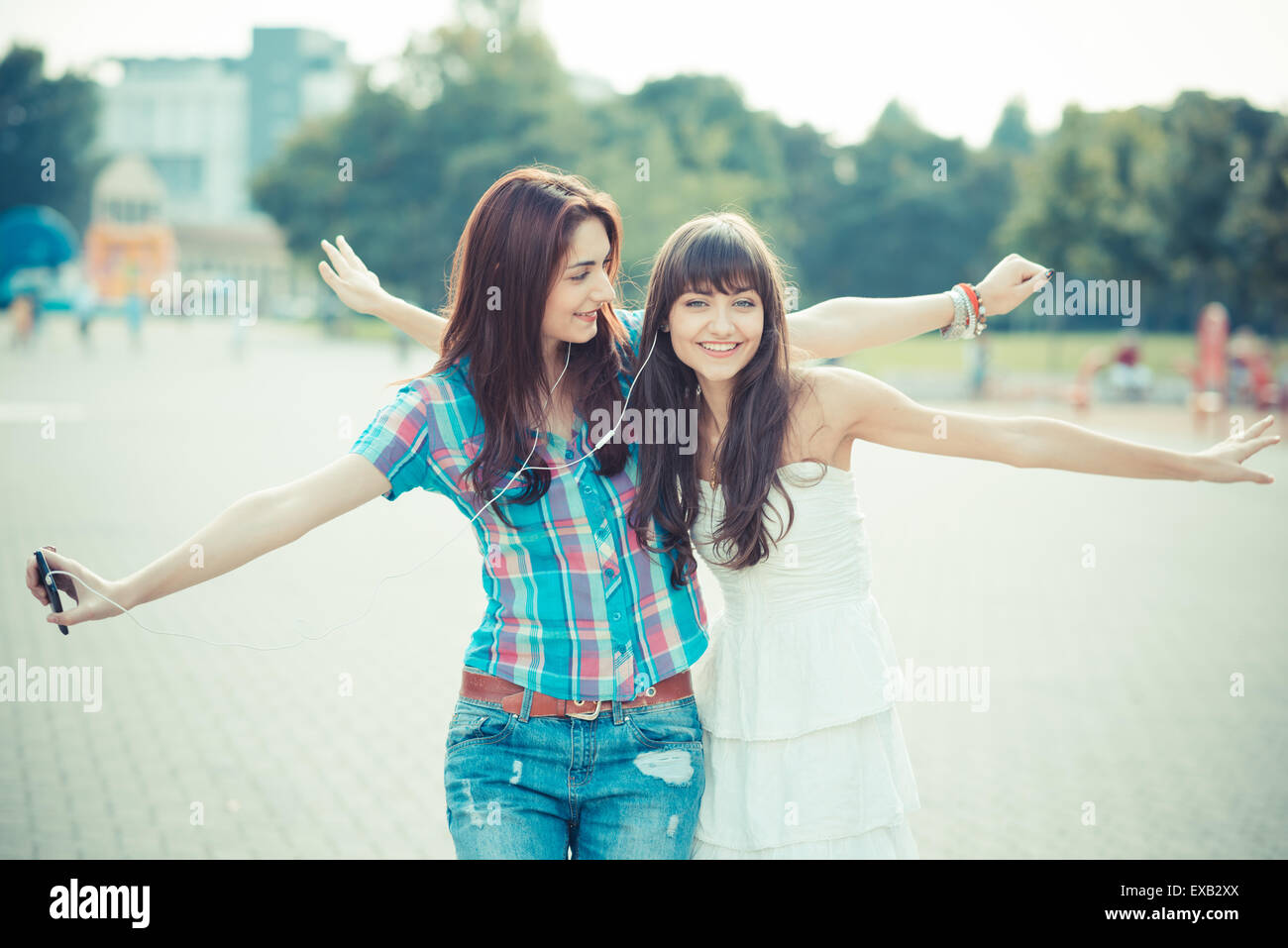 Fashionable women dancing together hi-res stock photography and images ...
