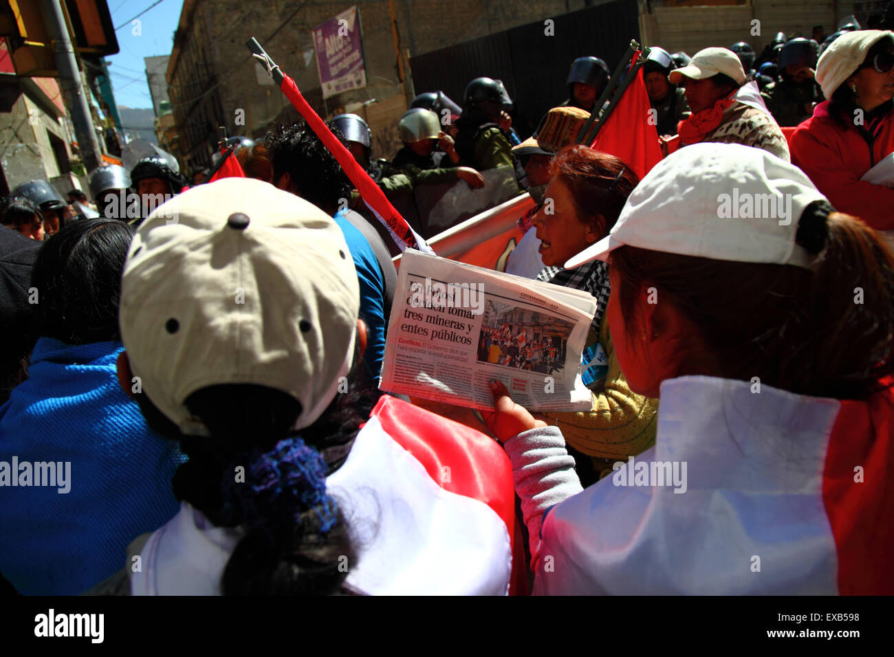 La Paz, Bolivia, 10th July 2015. A protestor from Potosi reads a ...
