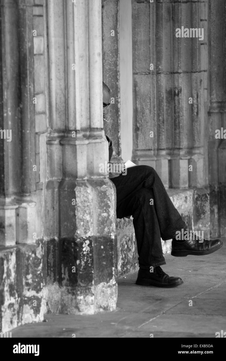 Man smoking half hidden in alcove, De Dom Church, Utrecht Stock Photo ...