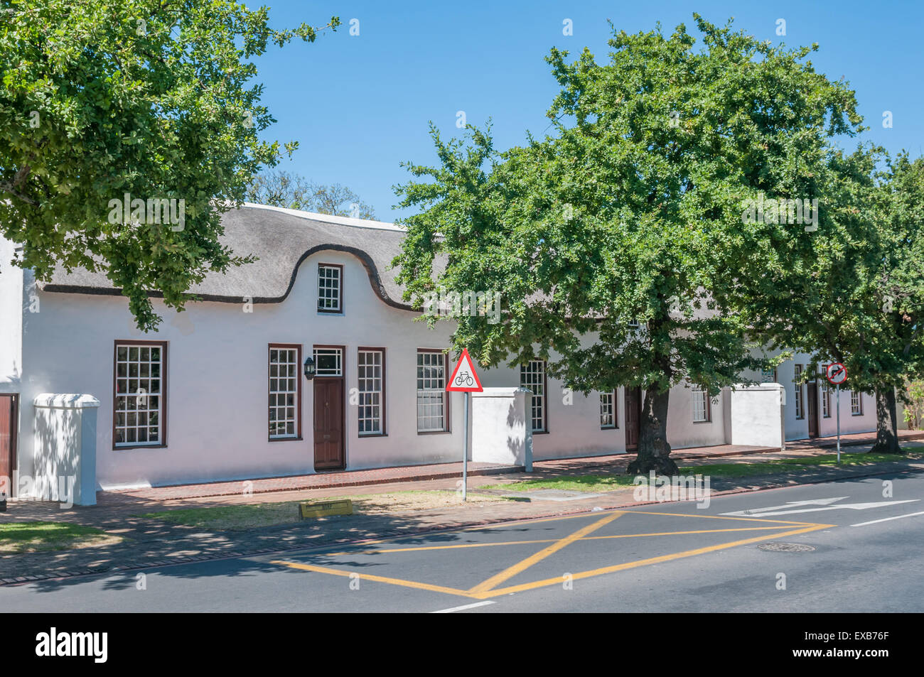 Historical buildings in oak tree lined streets Stock Photo - Alamy