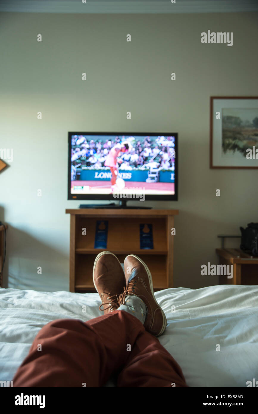 Businessman resting in the hotel room Stock Photo - Alamy