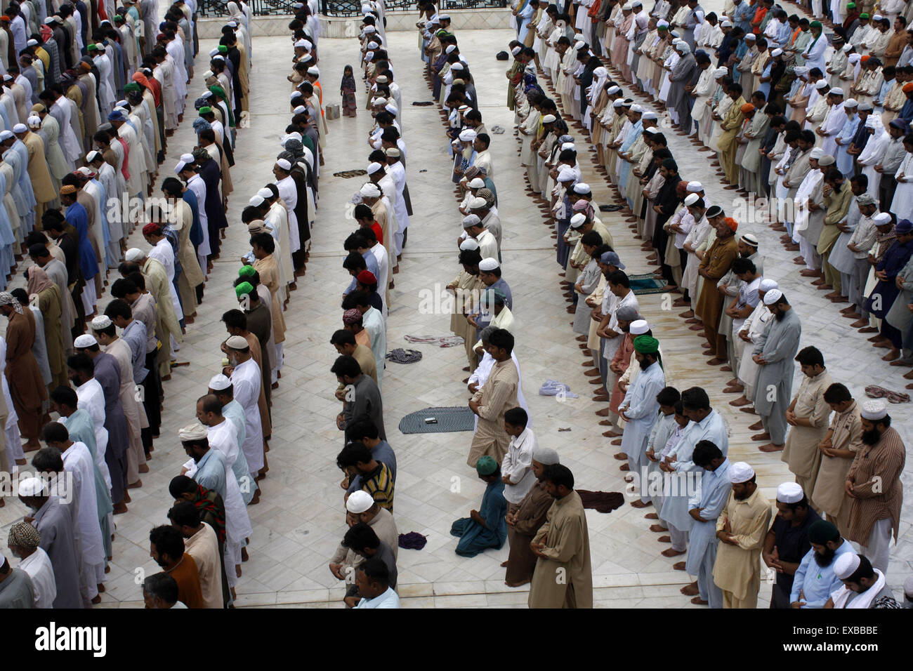 Lahore. 10th July, 2015. Pakistani Muslims offer Friday prayers at a ...