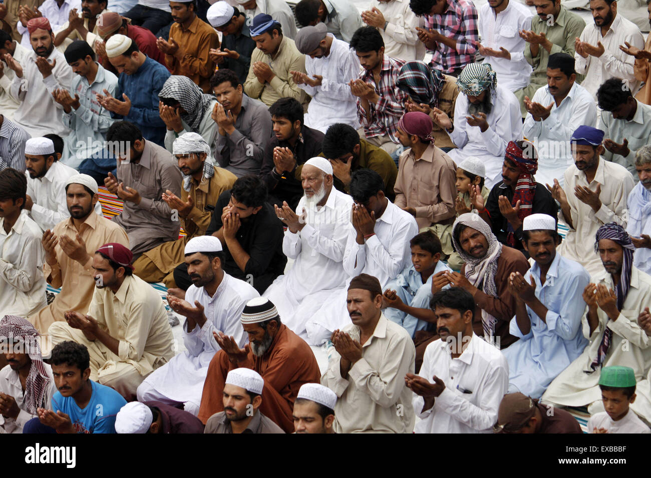 Lahore. 10th July, 2015. Pakistani Muslims offer Friday prayers at a ...