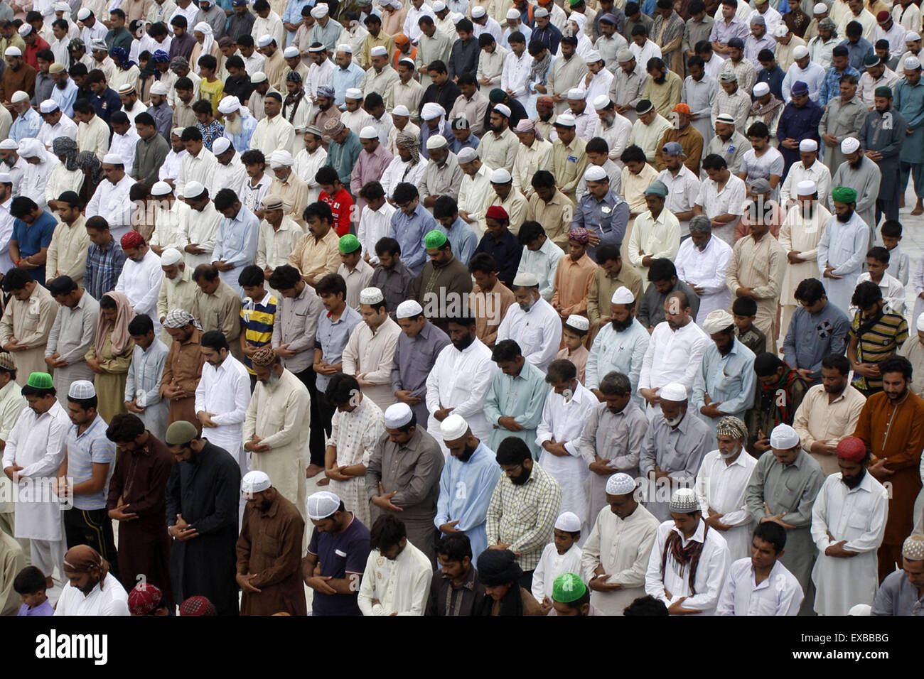 Lahore. 10th July, 2015. Pakistani Muslims offer Friday prayers at a ...