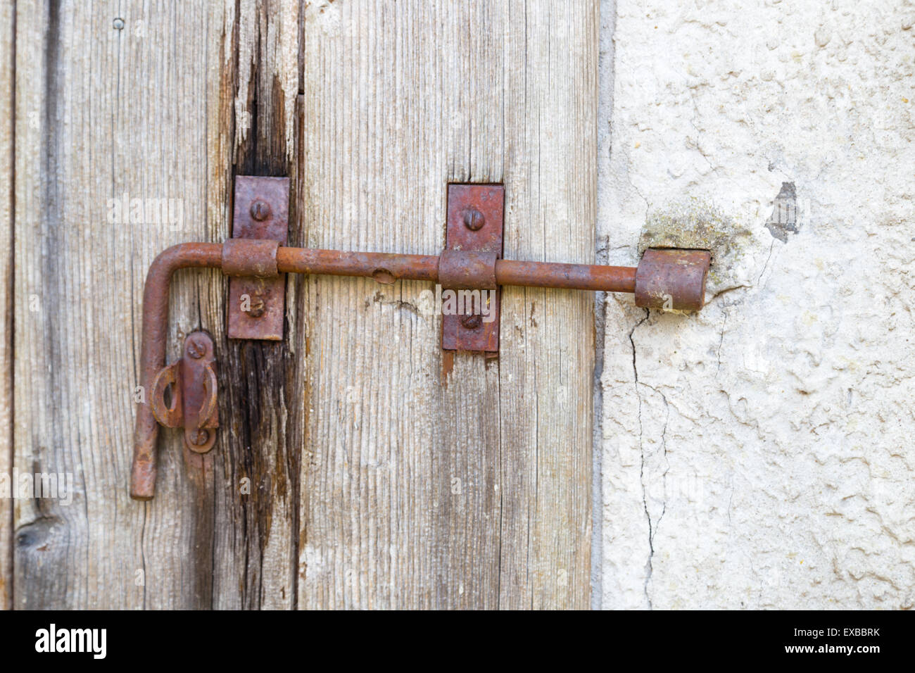 Rusty bolt of the door of an 14th century mill in Italian countryside ...