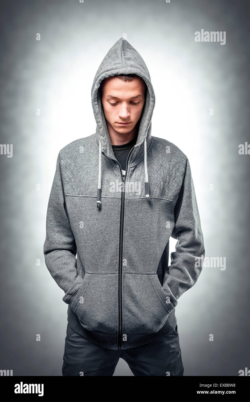 Young man in stylish sweatshirt Stock Photo - Alamy