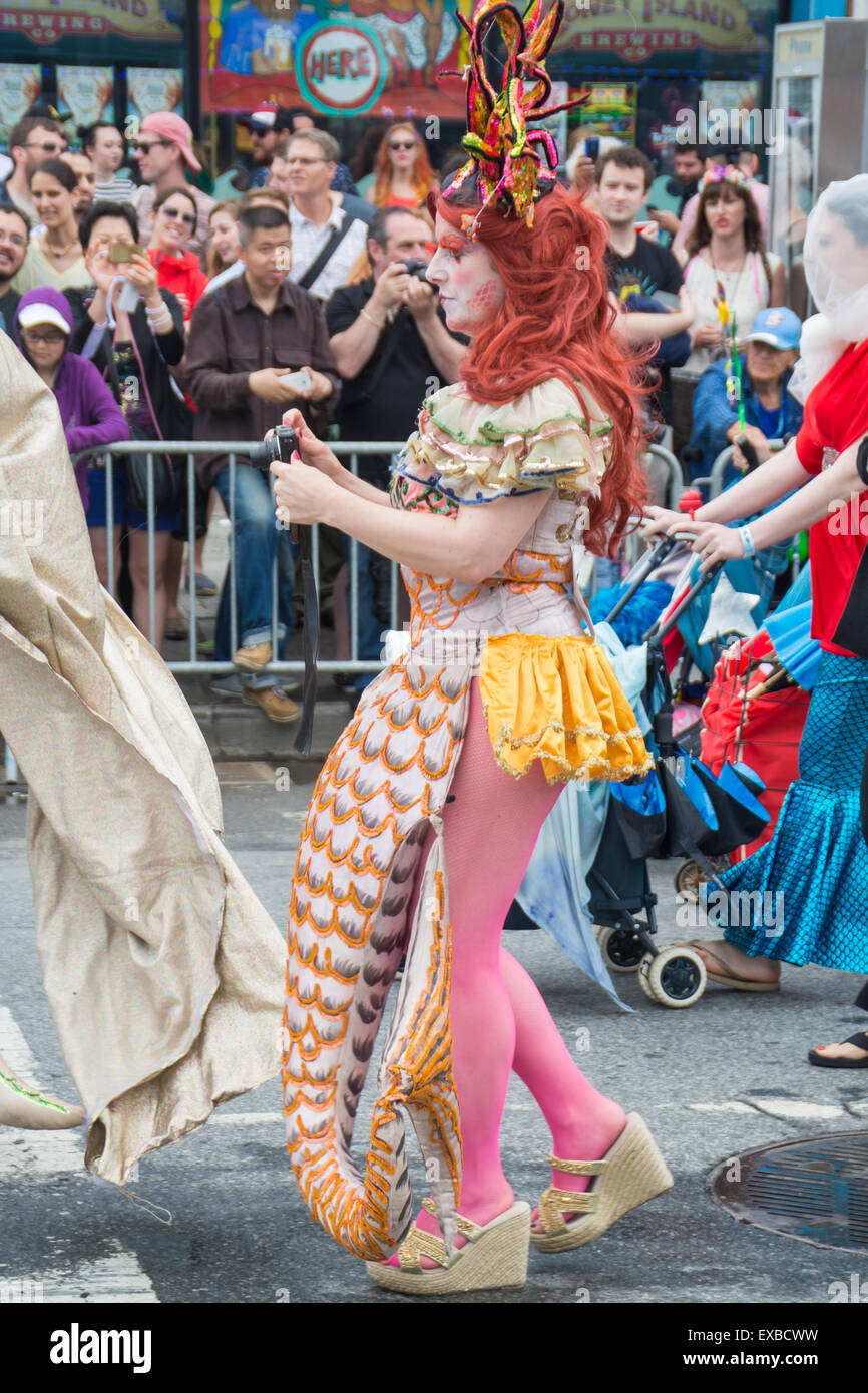 Woman at the Mermaid parade, the largest art parade in the nation and a ...