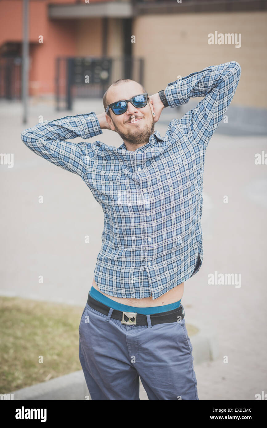 handsome hipster casual multitasking modern man in the city Stock Photo ...